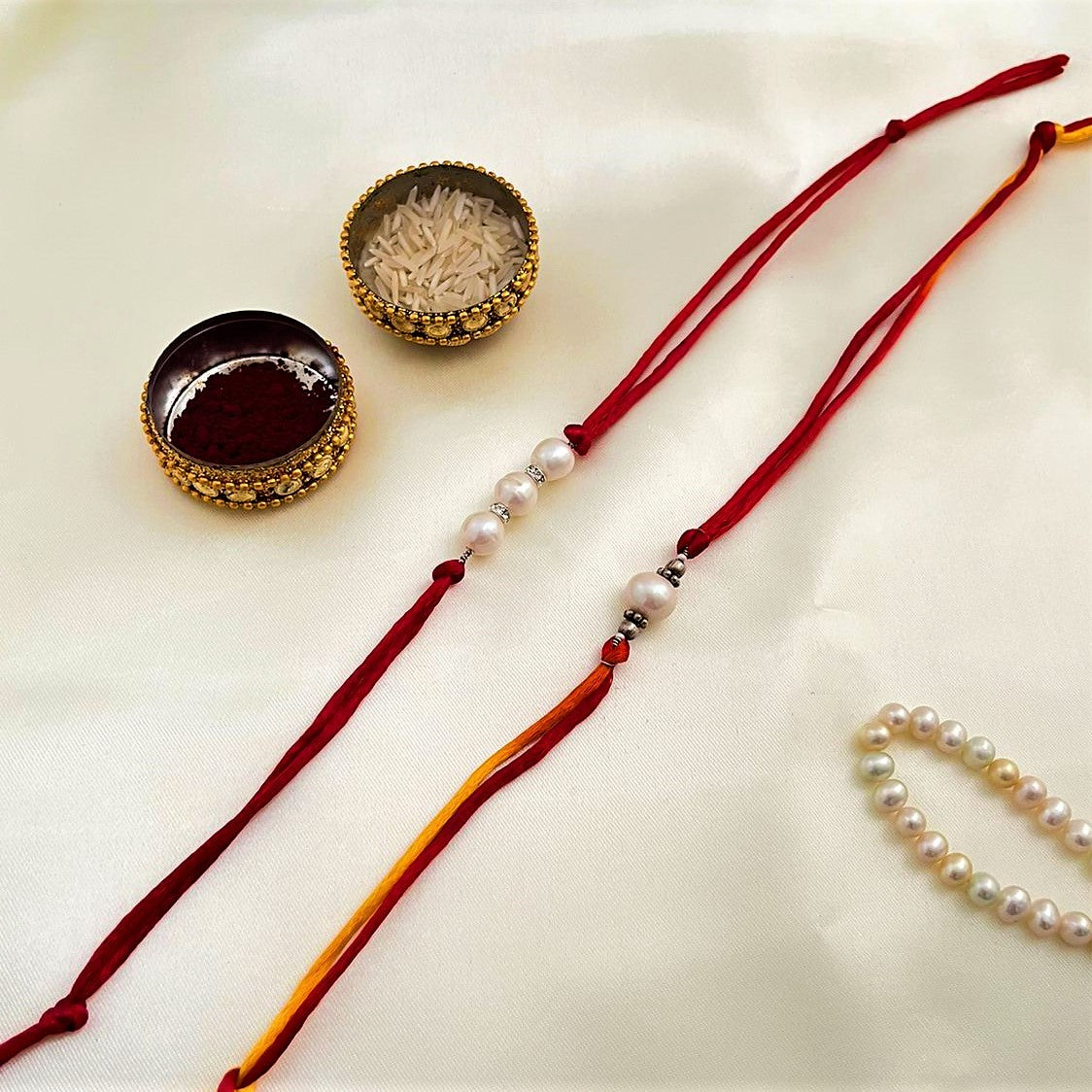 Buy Real Pearl Rakhi in 925 Silver & Mouli Thread Online- CherishBox – CherishBox Real Pearl ...